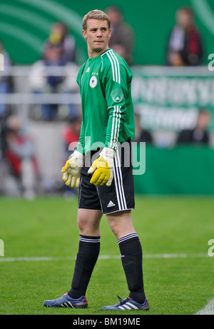 Goalkeeper of the German national soccer team, Manuel Neuer, warms up ...