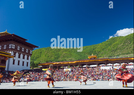 Dancers in traditional costume, Autumn Tsechu (festival) at Trashi ...