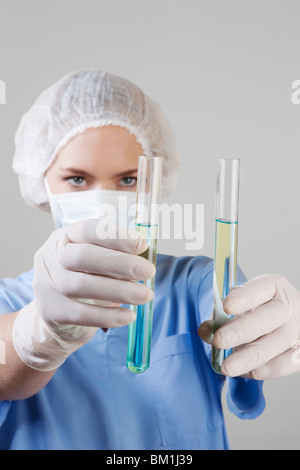 laboratory technician observation on test tube Stock Photo - Alamy