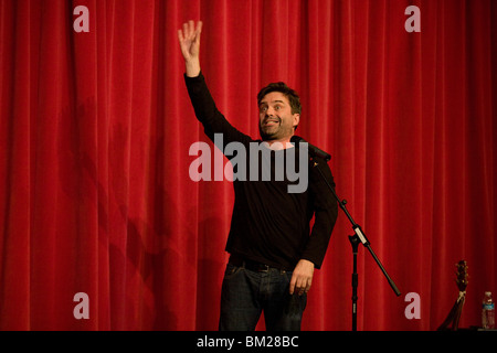 The stand-up comedian Phil Nichol performs on stage in London Stock ...
