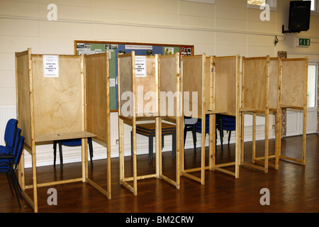 Voting booths are set up at a polling location inside St. Luke's ...