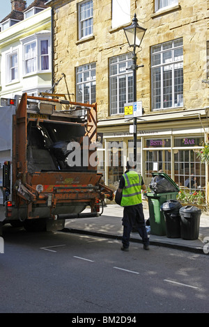 Dustbin workers collecting bags of rubbish Stock Photo - Alamy