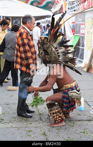 Aztec folk healer, shaman practising spiritual cleansing,Plaza de la ...