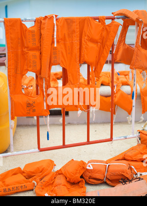 Life jackets drying Stock Photo - Alamy