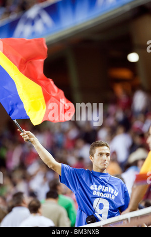 Romania football supporter on stadium. Romanian fans on soccer pitch ...
