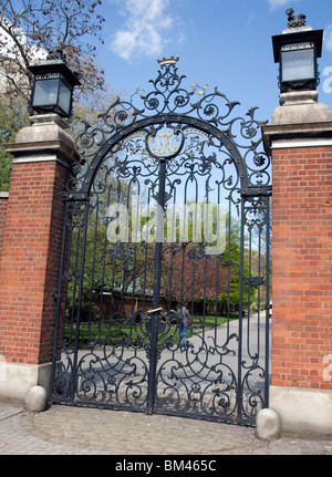 The wrought iron entrance gates to Kensington Palace gardens in London ...