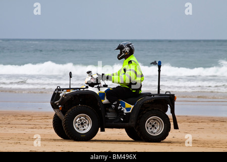 Beach Patrol and law enforcement vehicles and headquarters provide ...