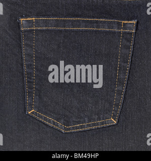 Dark blue jeans back pocket isolated on white background. Closeup of ...