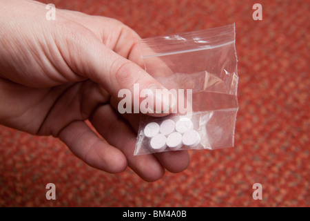 ECSTACY or MDMA TABLETS. Tablets in a bag or baggy Stock Photo - Alamy