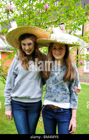 School girls wearing straw hats and uniform on a day out at the Royal ...