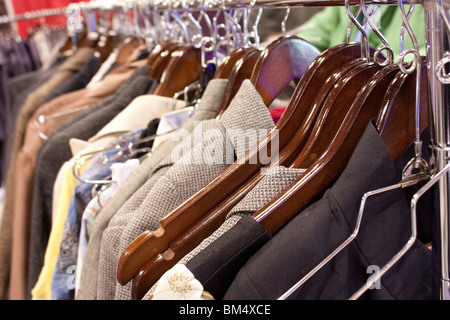 messy clothing rack Stock Photo - Alamy