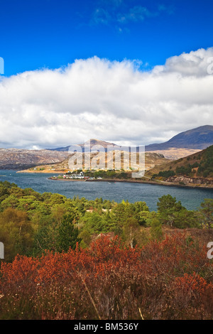 The summer loch and mountain landscape of Loch Shieldaig and village in ...