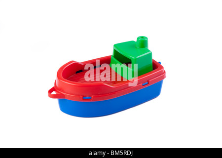 Plastic toy boat isolated on a white background Stock Photo - Alamy