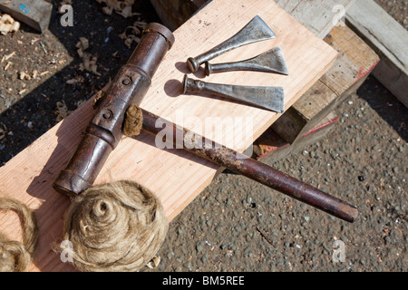 Carpentry tools of a master ship builder, including a caulking hammer ...