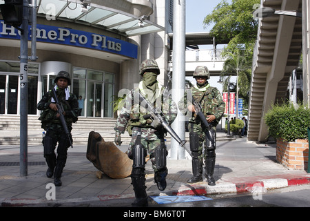 On May 19th, Thai soldiers rest in Chit Lom during a military assault ...
