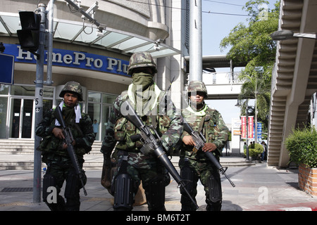 On May 19th, Thai soldiers rest in Chit Lom during a military assault ...