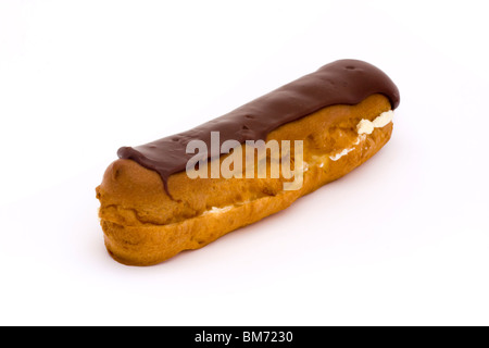 A single Chocolate Eclair on a plate against a white background Stock ...