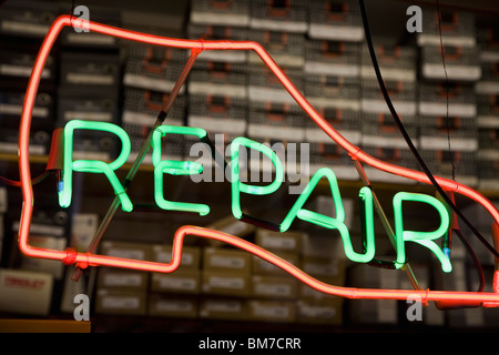 neon shoe repair sign Stock Photo - Alamy