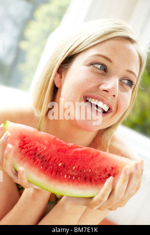 Fresh fruit. Teenager girl hold apples on white isolated studio ...