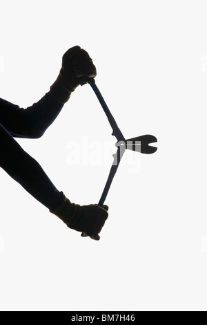 Man holding bolt cutters Stock Photo - Alamy