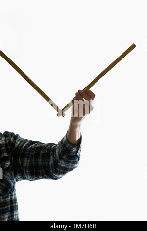 A carpenter using a folding ruler Stock Photo - Alamy