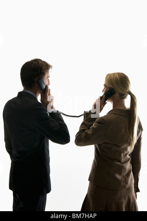woman using a phone and the cord connected to a globe Stock Photo - Alamy