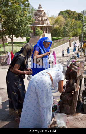 Indian women prostrating at Matangesvara Temple. Khajuraho. Madhya ...