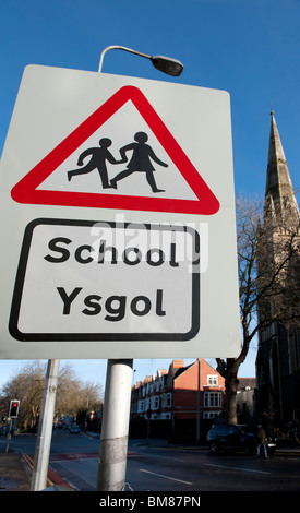 Bilingual sign school ysgol welsh English warning triangle sign Stock ...