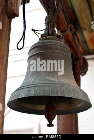 A vertical shot of an old thick rope on a metal grid in a garden Stock ...