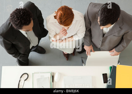 Business team hands collaborating on UI UX design creative process with ...