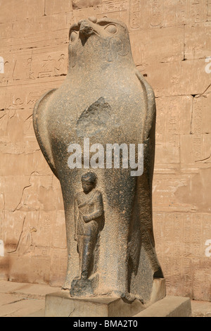 Close up of the statue of Horus of Behdet in the forecourt at the ...