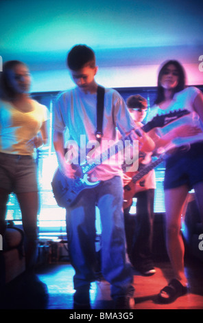 enthusiastic teenagers at rock concert Stock Photo - Alamy