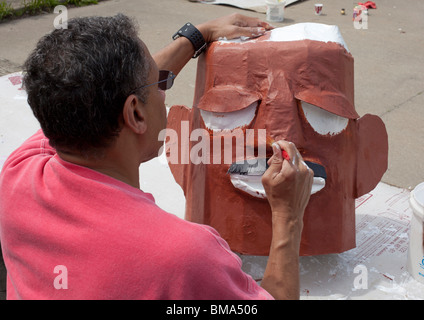 papier mache head of a giant puppet groom figure on plaza outside Santo ...