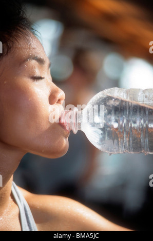 Asian sports woman in the gym, athletes training, workout lifting ...