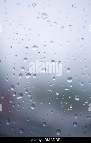A closeup shot of raindrops on the window on a rainy weather Stock ...