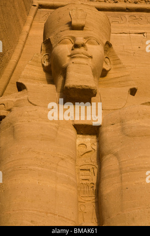 closeup of the pharaoh Ramses at the sun temple of Abu Simbel lit up in ...