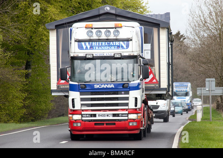 Traffic on the A75 wide or abnormal load static caravan on the back of ...