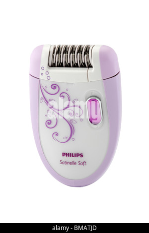 Woman epilating leg, white electric epilator. woman shaving her legs ...