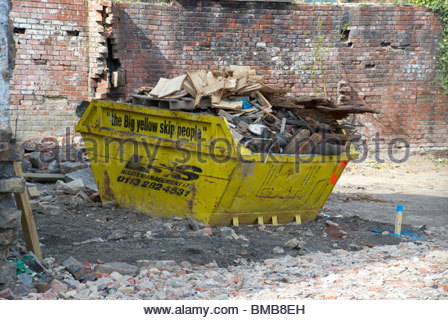 Overloaded skip on a building site - waste segregation Stock Photo ...