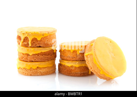 Yellow easter cake stacked on white background Stock Photo - Alamy
