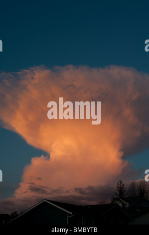 Cumulonimbus thunder cloud with anvil head rising above the Tuscan ...