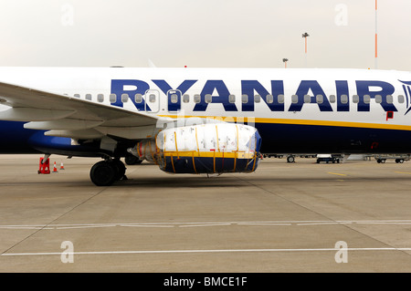 Ryanair plane with engine covered up in plastic to protect from ...
