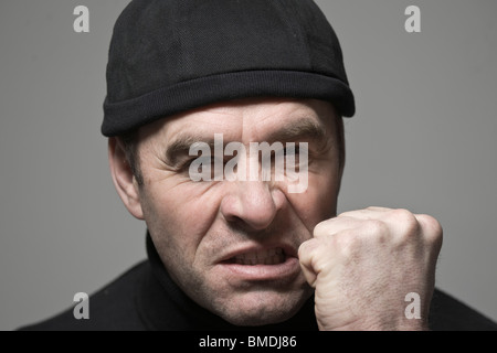 angry white man making a threatening face Stock Photo - Alamy