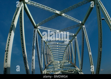 The steel girders in a cobweb shape for the single arch Runcorn Bridge ...