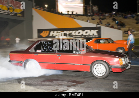 Australian Holden Commodore drag race racing car performing a burnout ...