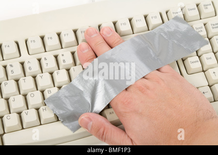 Hand had been stuck on Computer Keyboard Stock Photo - Alamy