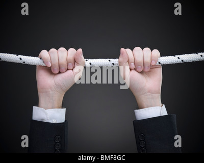 hand hands hold grab rope hang hanging hang up man close humans human ...
