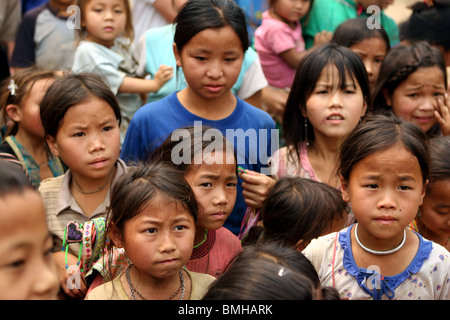 Young Black Hmong children in traditional cloth practice physical ...