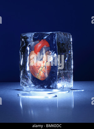 Heart inside ice cube on dark background. Cooling relations metaphor ...