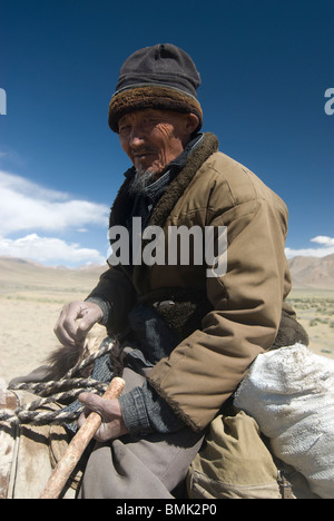 Man riding a yak, Pamir Highway, Tajikistan Stock Photo - Alamy